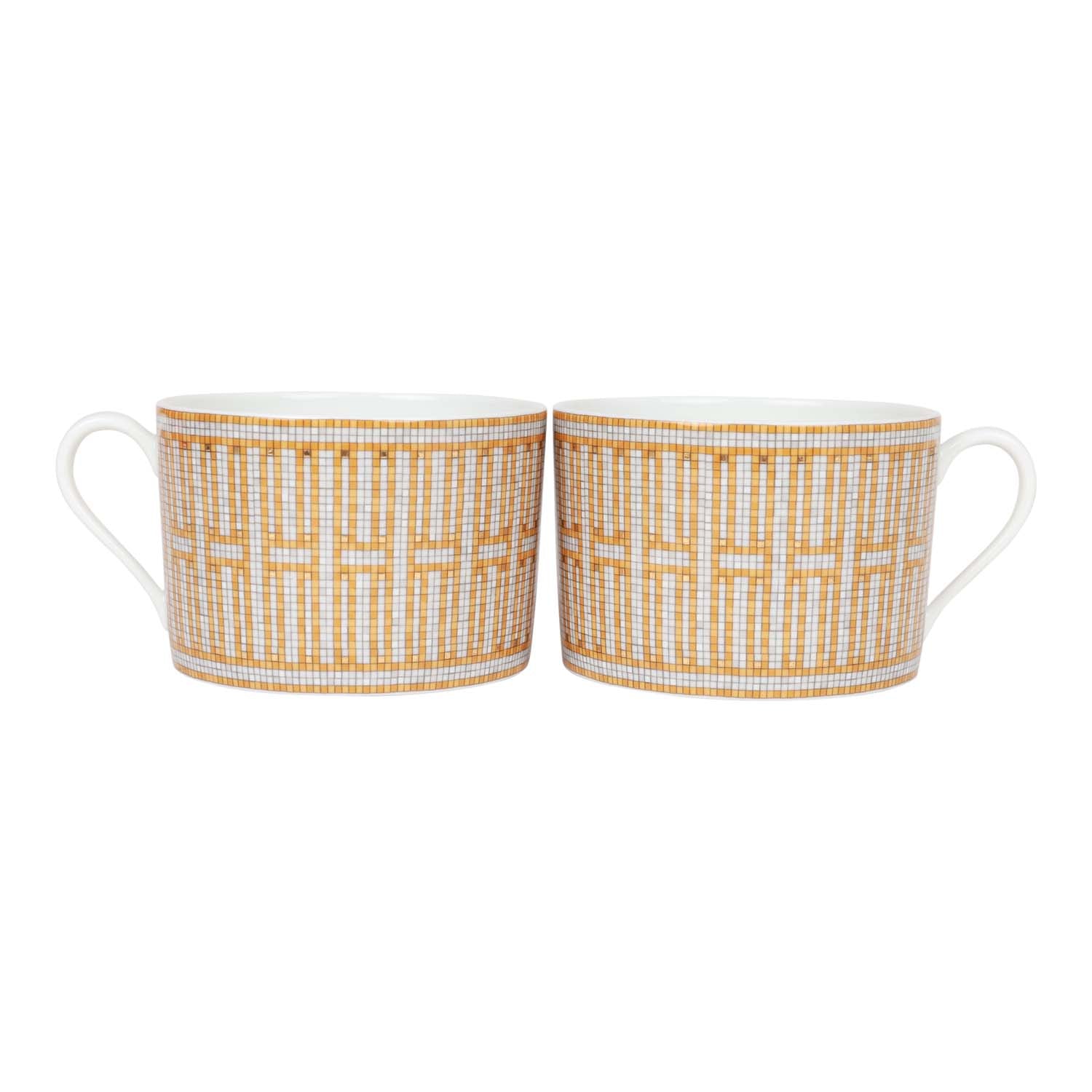Hermes "Mosaique Au 24" Gold Porcelain Tea Cup and Saucer Set